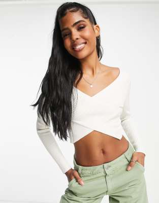 Pull&Bear bandage front cropped long sleeve knitted top in ecru | ASOS