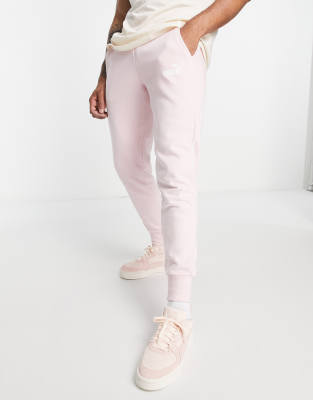 Puma essentials small logo joggers in chalk pink | ASOS