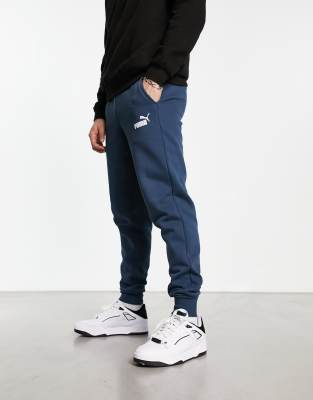 Puma essentials trackies with logo in navy | ASOS