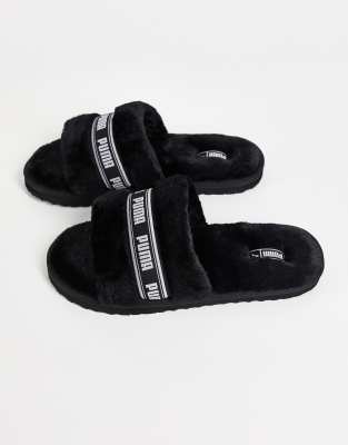 Puma Fluff slippers in black | ASOS