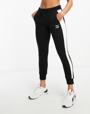 Puma Iconic T7 track joggers in black | ASOS