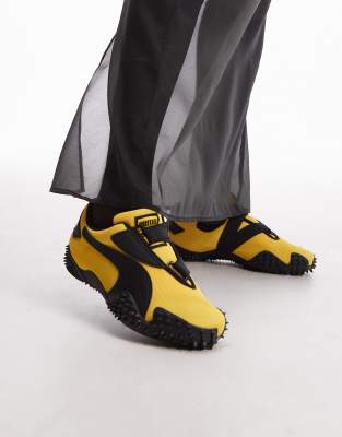 PUMA – Mostro OG Prime – Gula och svarta träningsskor i unisex-modell ...