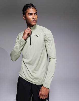 Puma Tad Tech Fabric Mix 1/4 zip training top in green | ASOS