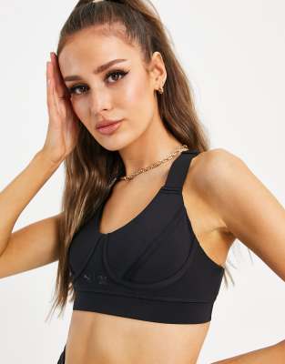 PUMA Training First Mile mid support sports bra in black | ASOS