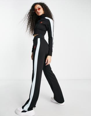PUMA X Dua Lipa flared leggings in black | ASOS