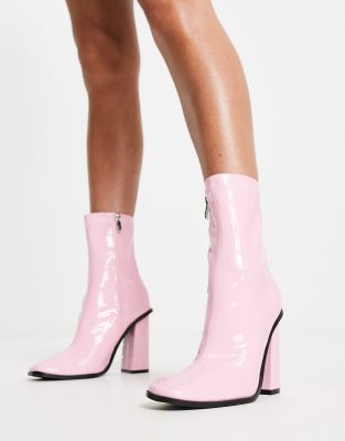 RAID Saylor block heel sock boots in pink | ASOS