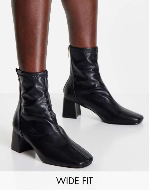 RAID Wide Fit Maddy mid heel sock boots in black | ASOS
