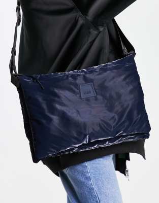 Rains Loop waterproof puffer crossbody bag in ink | ASOS