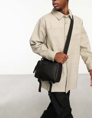 Rains Texel crossbody bag in black | ASOS