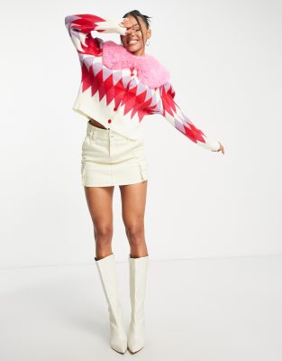 Rebeca rosa multicolor con estampado de rombos y ribete de piel ...