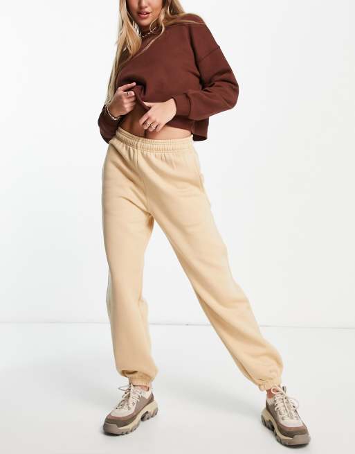 Rebellious Fashion oversized trackies in sand | ASOS