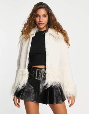 Reclaimed Vintage cropped fur jacket in cream | ASOS