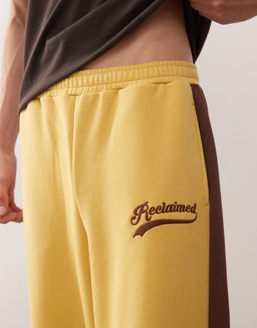 Reclaimed Vintage heavyweight wide leg sweatpants in mustard with brown ...
