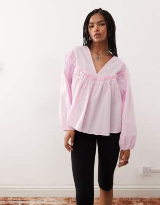 Reclaimed Vintage smock top with v neck and ruffle detail in baby pink ...