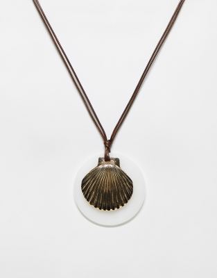 Reclaimed Vintage unisex shell necklace on brown cord | ASOS