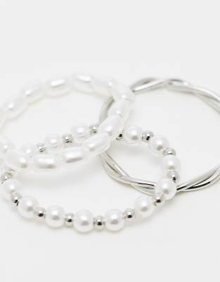 Reclaimed Vintage unisex stretchy ring pack in silver and pearl | ASOS