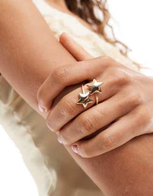 Reclaimed Vintage wraparound star ring in gold | ASOS