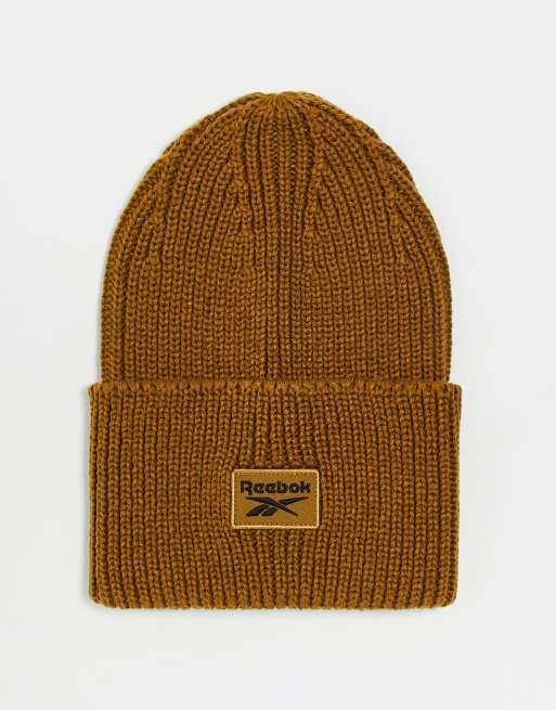 Reebok ribbed logo beanie in mustard brown | ASOS