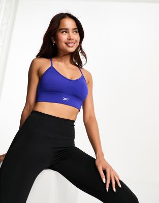 Reebok Workout Ready strappy sports bra in blue | ASOS