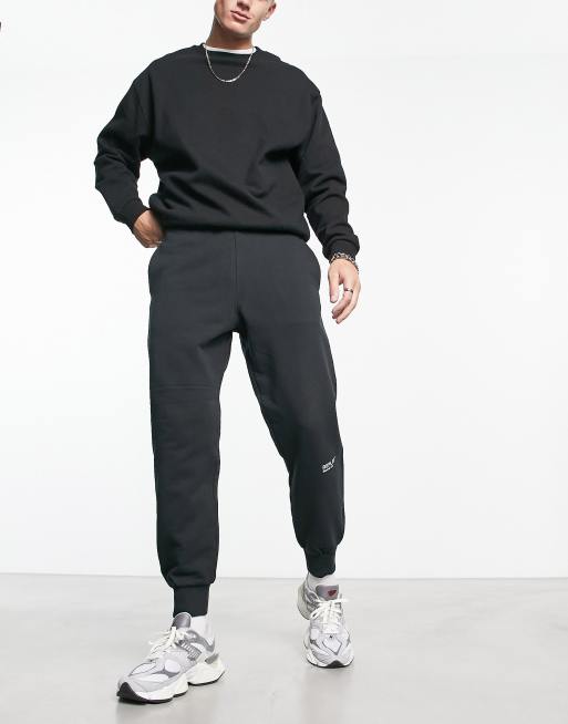 Replay trackies in black | ASOS