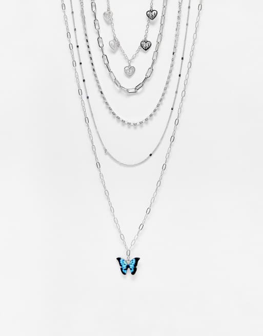 River Island - Collier multi-rangs avec pendentif papillon - Argenté | ASOS