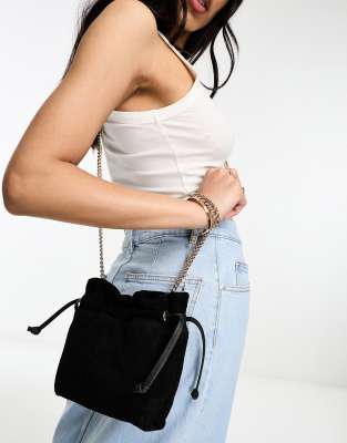 River Island drawstring suede bag in black | ASOS