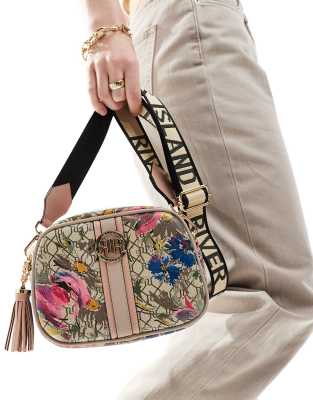 River Island floral print monogram cross body bag in beige | ASOS