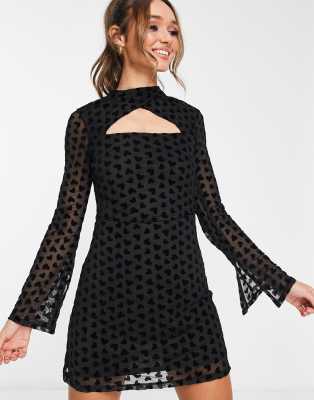 River Island heart mesh cut out mini dress in black devore | ASOS