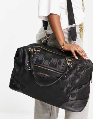 River Island jacquard monogram weekend bag in black | ASOS