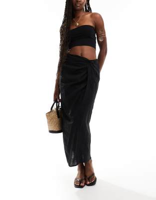 River Island - Jupe fourreau en lin coupe portefeuille - Noir | ASOS