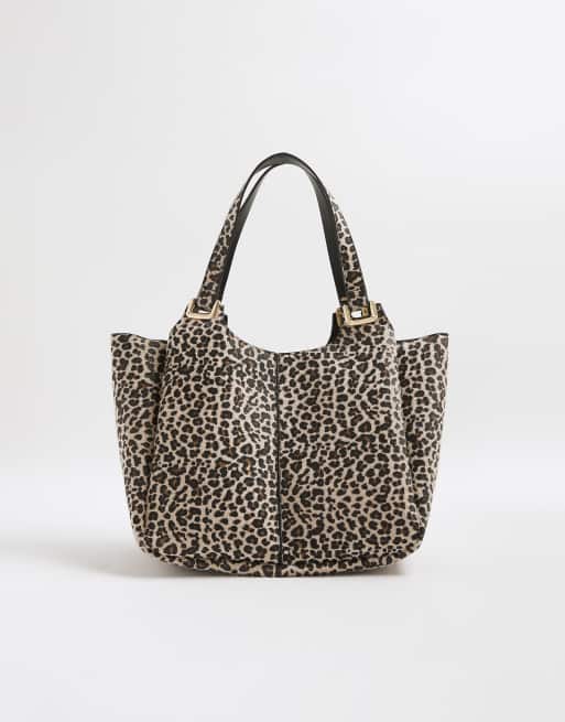 River Island Leopard print winged shoulder bag in beige | ASOS