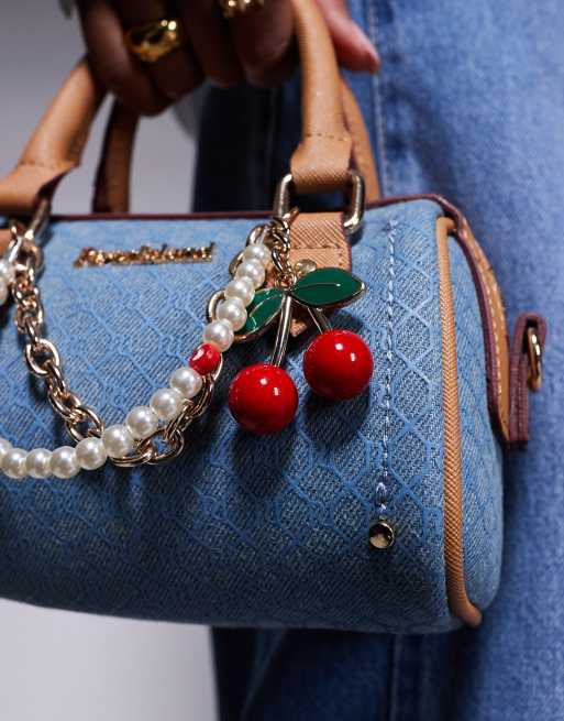 River Island mini denim bowler bag in mid blue | ASOS