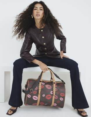 River Island Monogram lip print holdall bag in brown - dark | ASOS