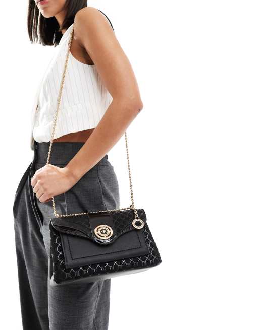 River Island monogram shoulder bag in black | ASOS