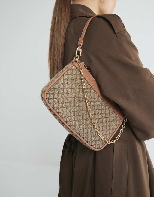 River Island monogram shoulder bag in brown | ASOS