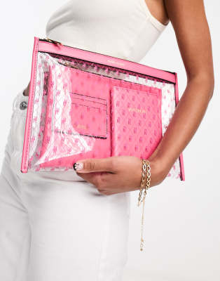 River Island monogram travel pouch in pink | ASOS