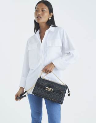 River Island Patent rr panelled shoulder bag in black | ASOS
