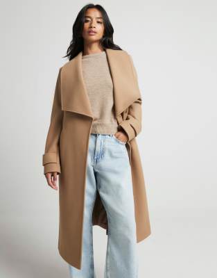 River Island Petite belted wrap coat in beige | ASOS