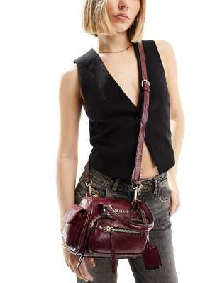 River Island small utilty bowler bag in dark red | ASOS