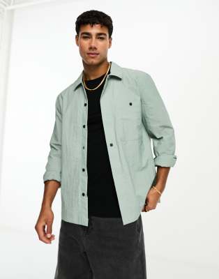 River Island utility shacket in sage | ASOS