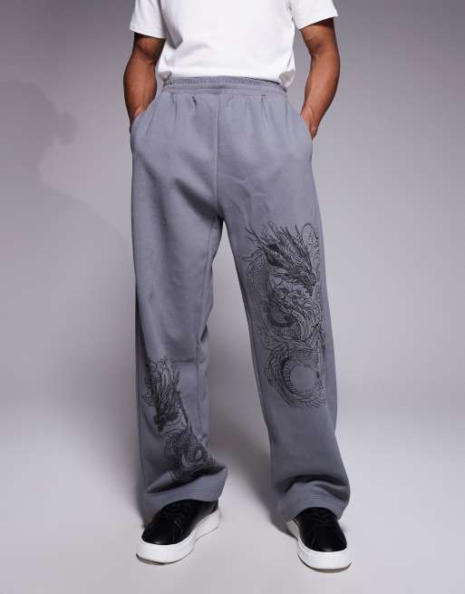 River Island wide leg dragon print trackies in grey | ASOS