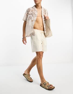 Shorts de baño blancos de largo medio de ASOS DESIGN | ASOS