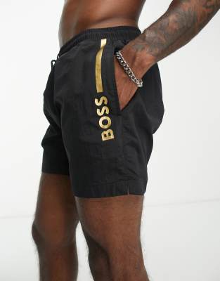 Shorts de baño negros con logo dorado Ole de BOSS Bodywear | ASOS