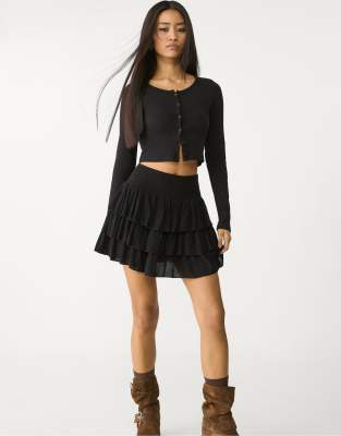 Stradivarius - Mini-jupe à volants - Noir | ASOS