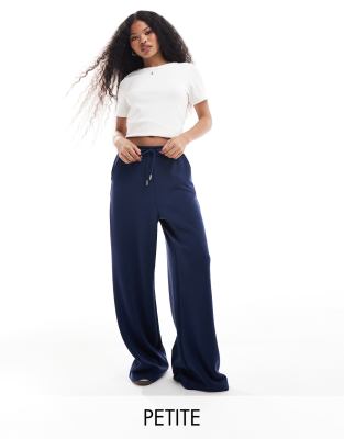 Stradivarius Petite soft touch wide leg trackies in navy | ASOS