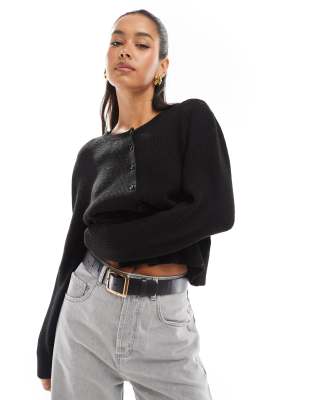 Stradivarius ribbed knit cardigan with buttons in black | ASOS