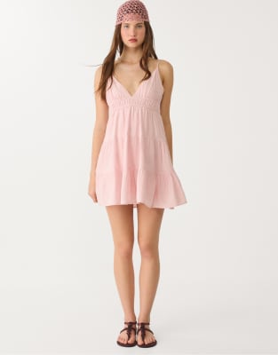 Stradivarius - Robe courte avec liens dans le dos - Rose pastel | ASOS