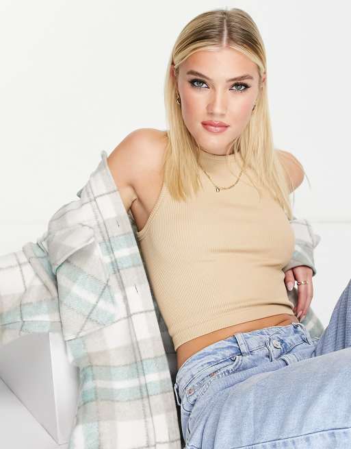 Stradivarius seamless ribbed tank in beige | ASOS