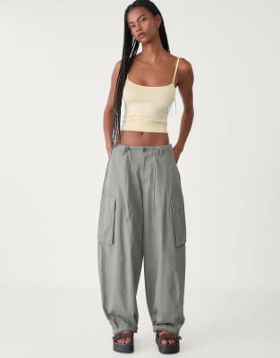 Stradivarius strappy polyamide top in pastel yellow | ASOS