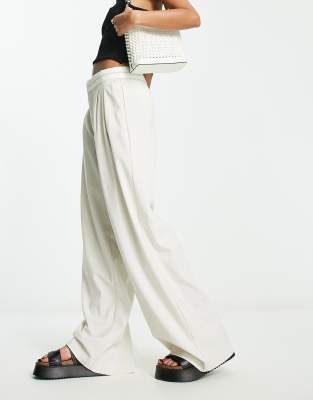 Stradivarius tailored wide leg pants with turn over waistband in ecru | ASOS